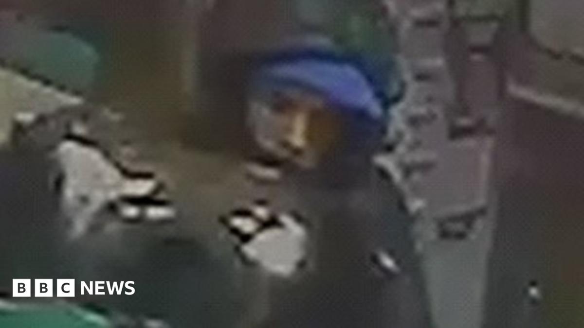 Robber sought after woman pinned down in Epsom robbery - BBC News