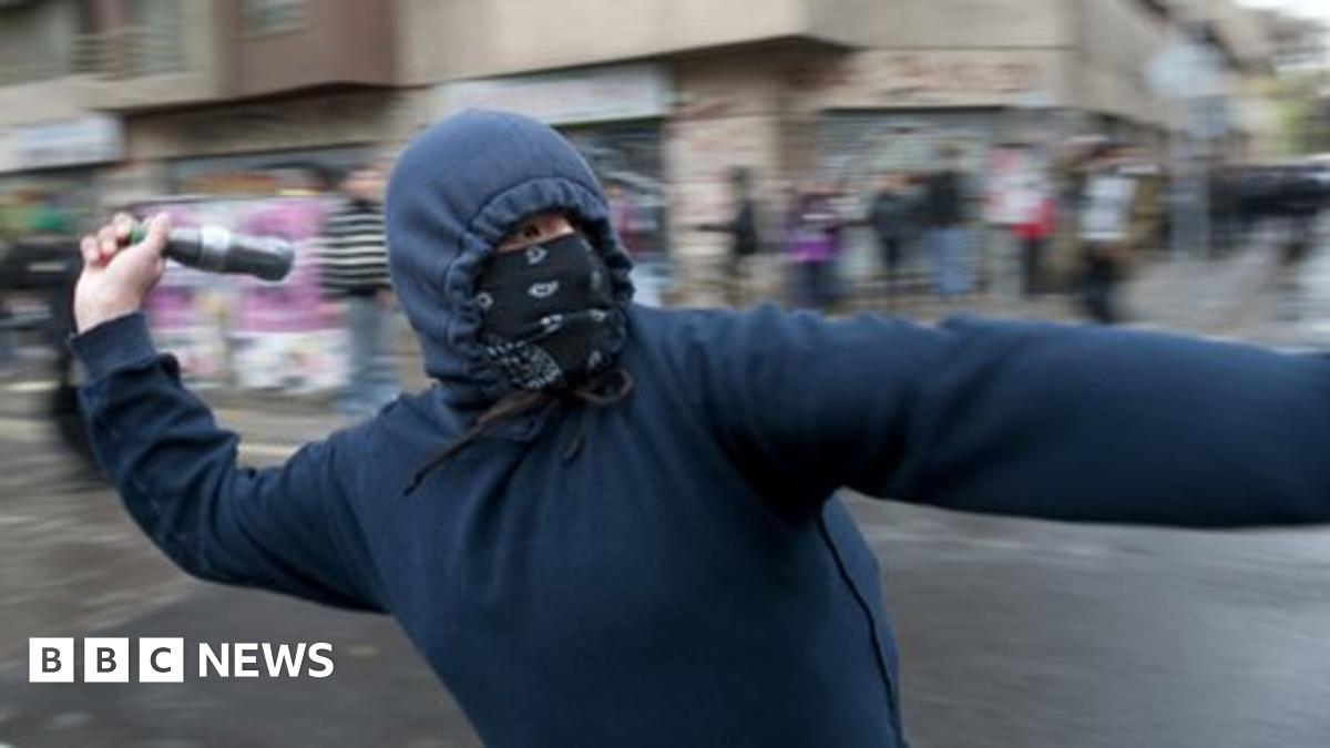 Unmasking Chile's hooded protest movement - BBC News