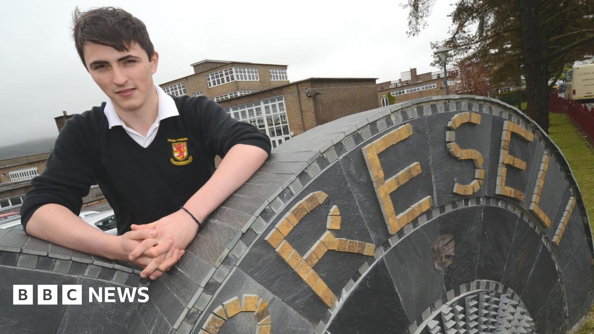 Schoolboy Aled James achieves 100% attendance for 13 years - BBC News