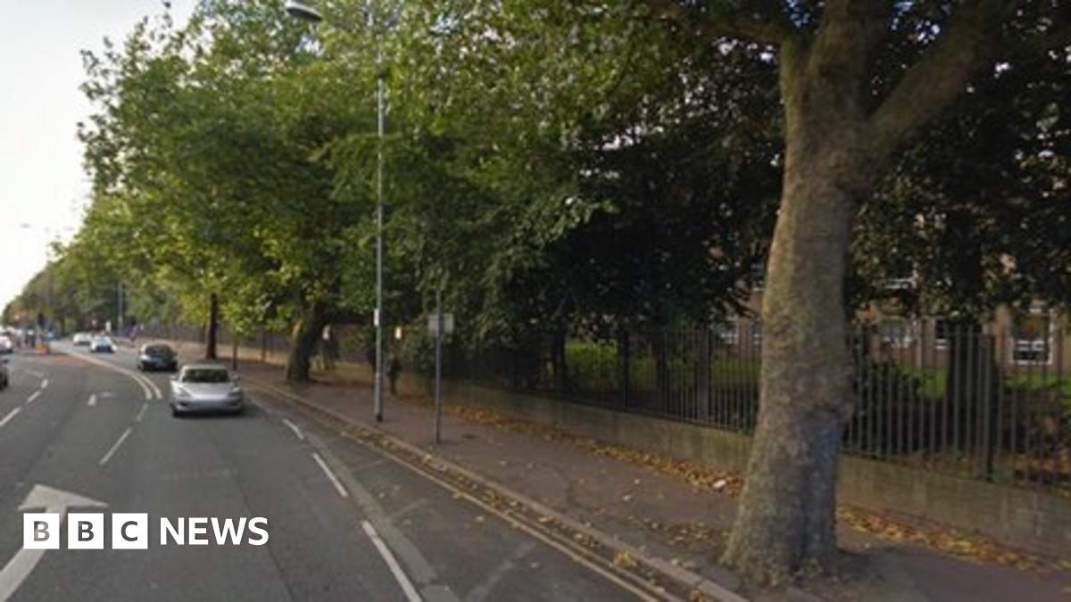 Woman impaled on Fallowfield railings freed by firefighters - BBC News