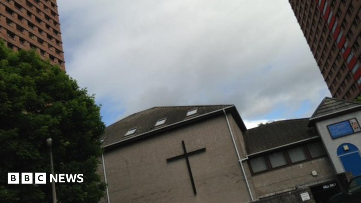 Dundee church in middle of tower block demolition - BBC News