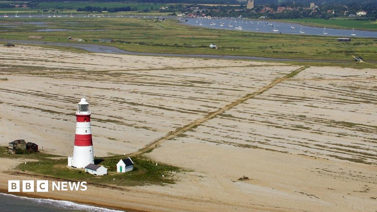 Orfordness lighthouse gets switched off and left to the sea - BBC News