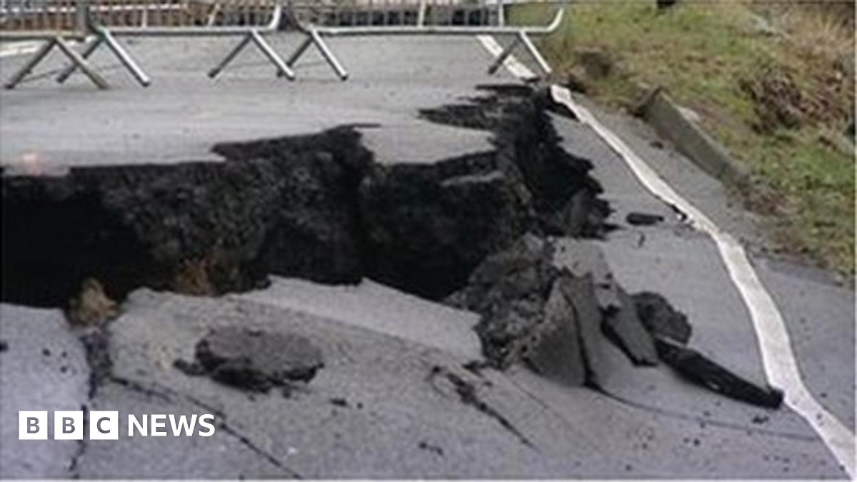 Oxfordshire collapsed road reopens a year on - BBC News
