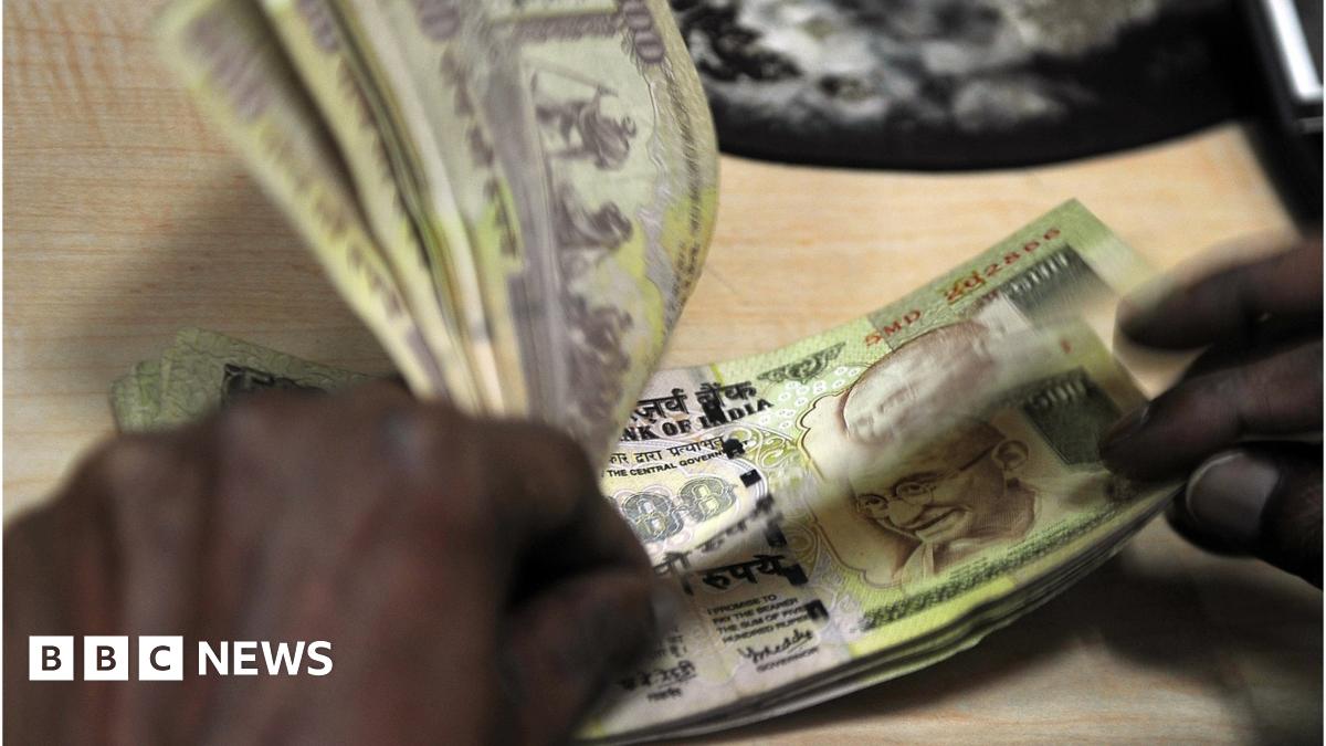 Rupee falls to a record low against the dollar - BBC News