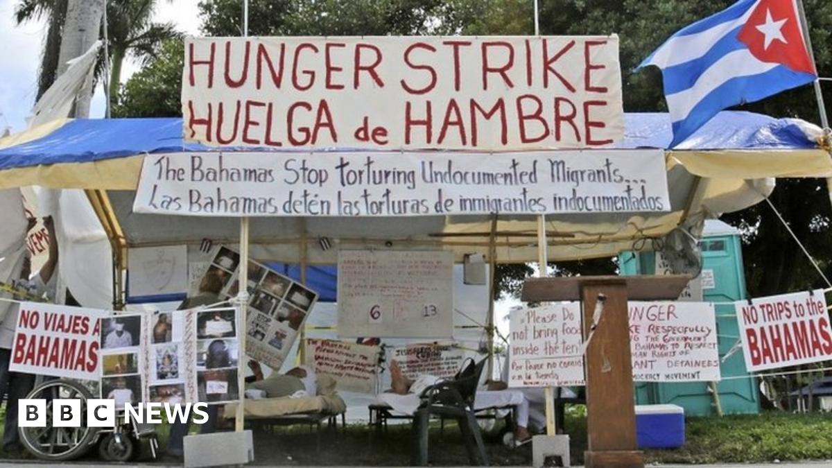 Bahamas deports Cuban refugees despite protests - BBC News