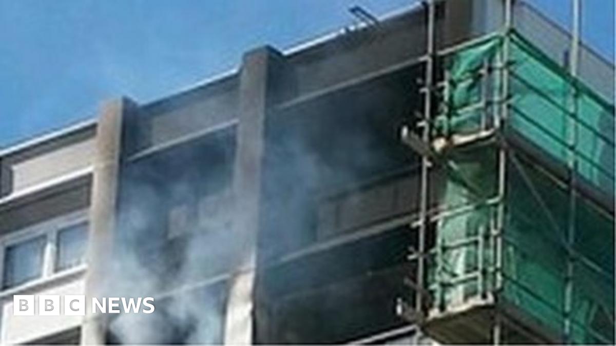Woodford Green tower block fire destroys flat - BBC News
