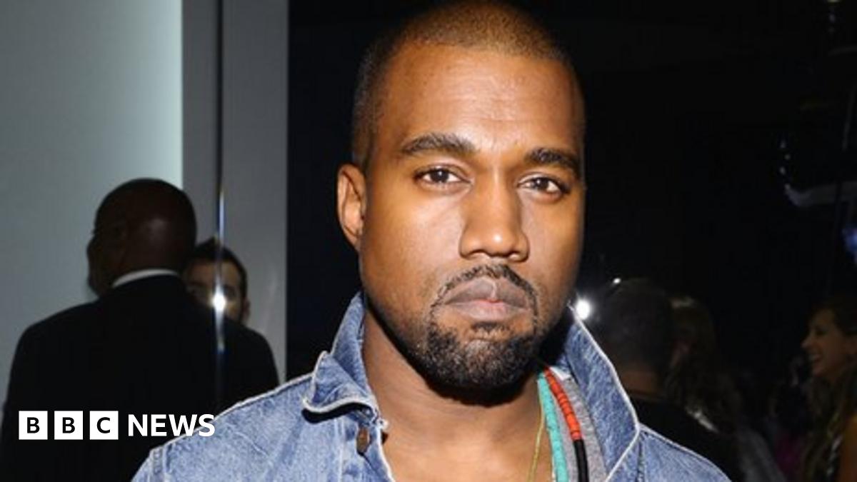 US rapper Kanye West charged over paparazzo attack - BBC News