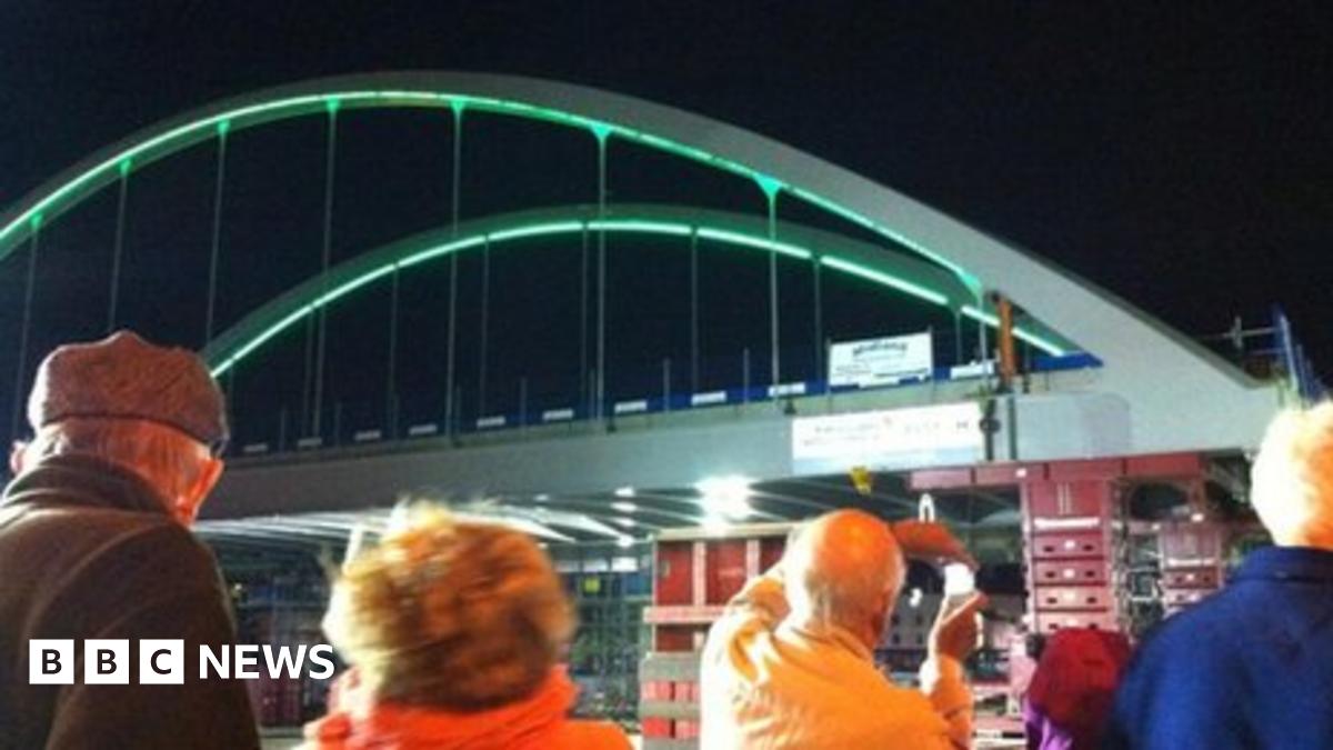 Nottingham QMC tram bridge 'inched' into position - BBC News