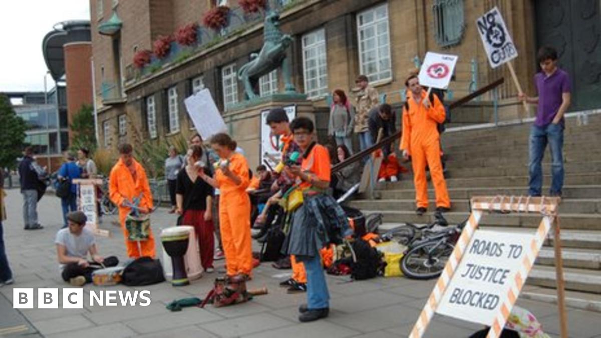 Legal aid protests held by UK Uncut - BBC News