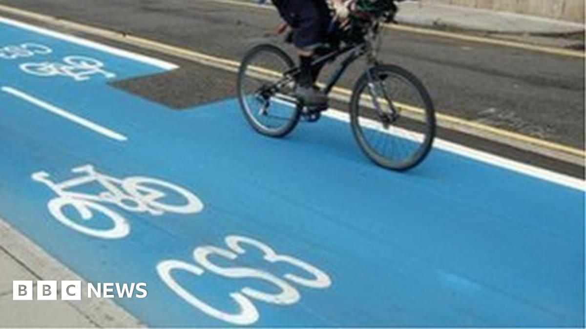 East London segregated cycle superhighway opened - BBC News