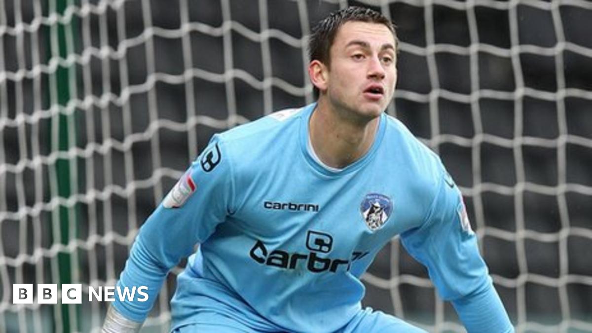 Burnley goalkeeper Alex Cisak sues over wrist operation - BBC News