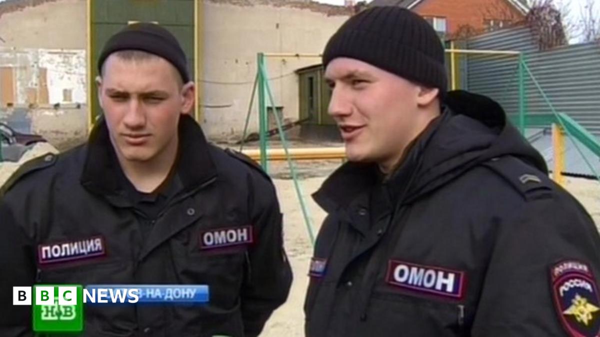 Russia: Riot police unit made up of identical twins - BBC News