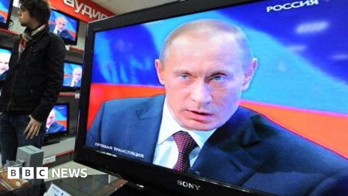 Russia media react to Putin press consolidation - BBC News