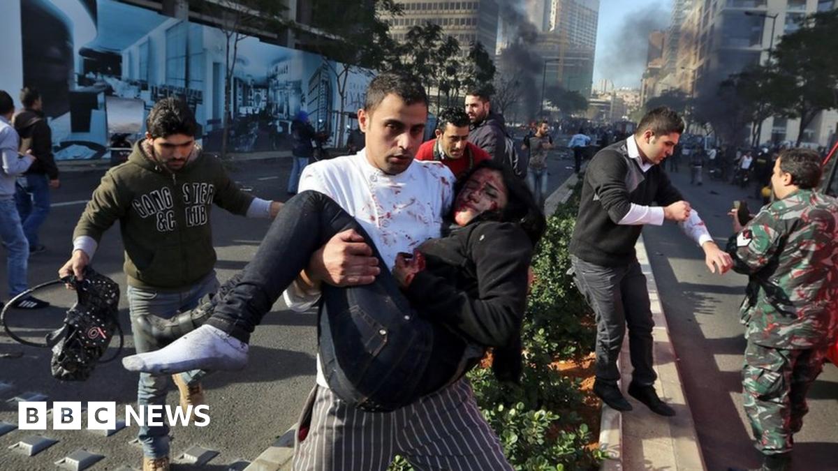 In pictures: Huge explosion in central Beirut - BBC News