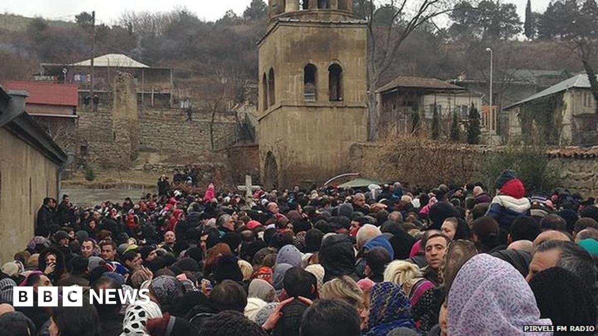 Georgia: Pilgrims seek wish fulfilment at monk's tomb - BBC News