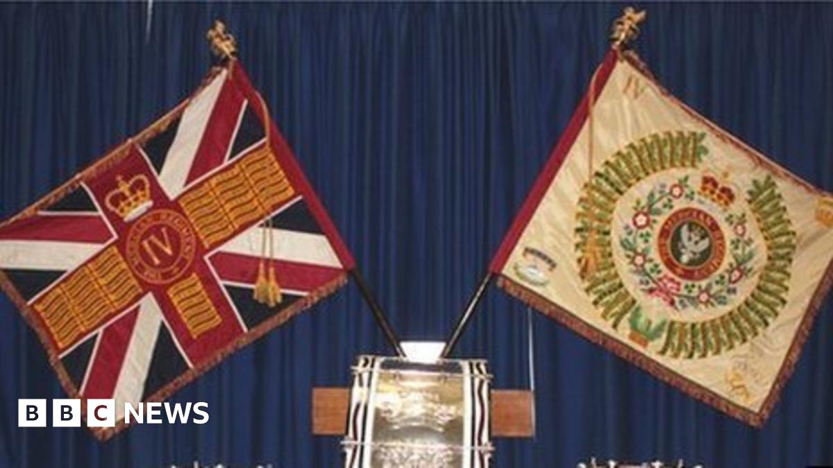 Regimental colours are laid to rest 'but never dead' - BBC News