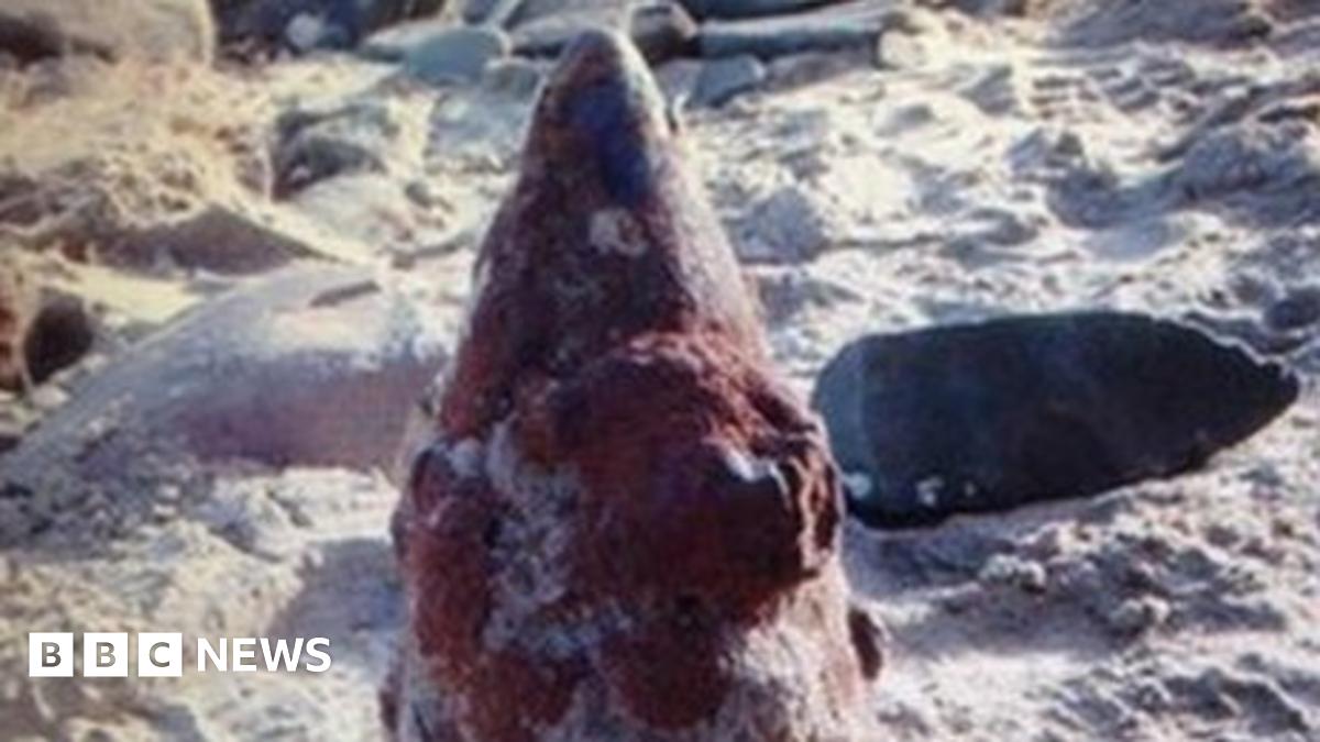 Storm reveals unexploded WW2 bomb on Crow Point beach - BBC News