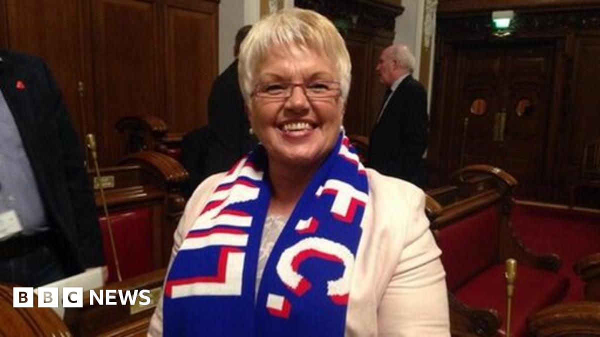 Row as Ruth Patterson puts on Linfield scarf at Belfast City Council ...