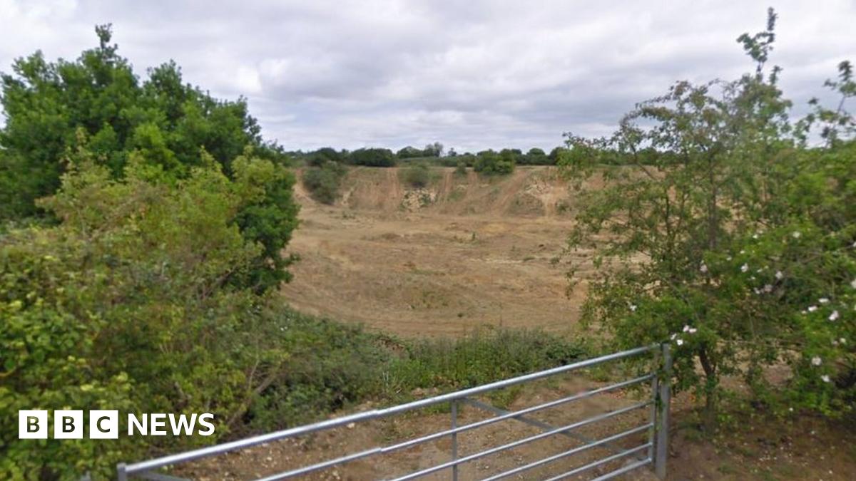 Girl rescued after getting stuck waist deep in mud - BBC News
