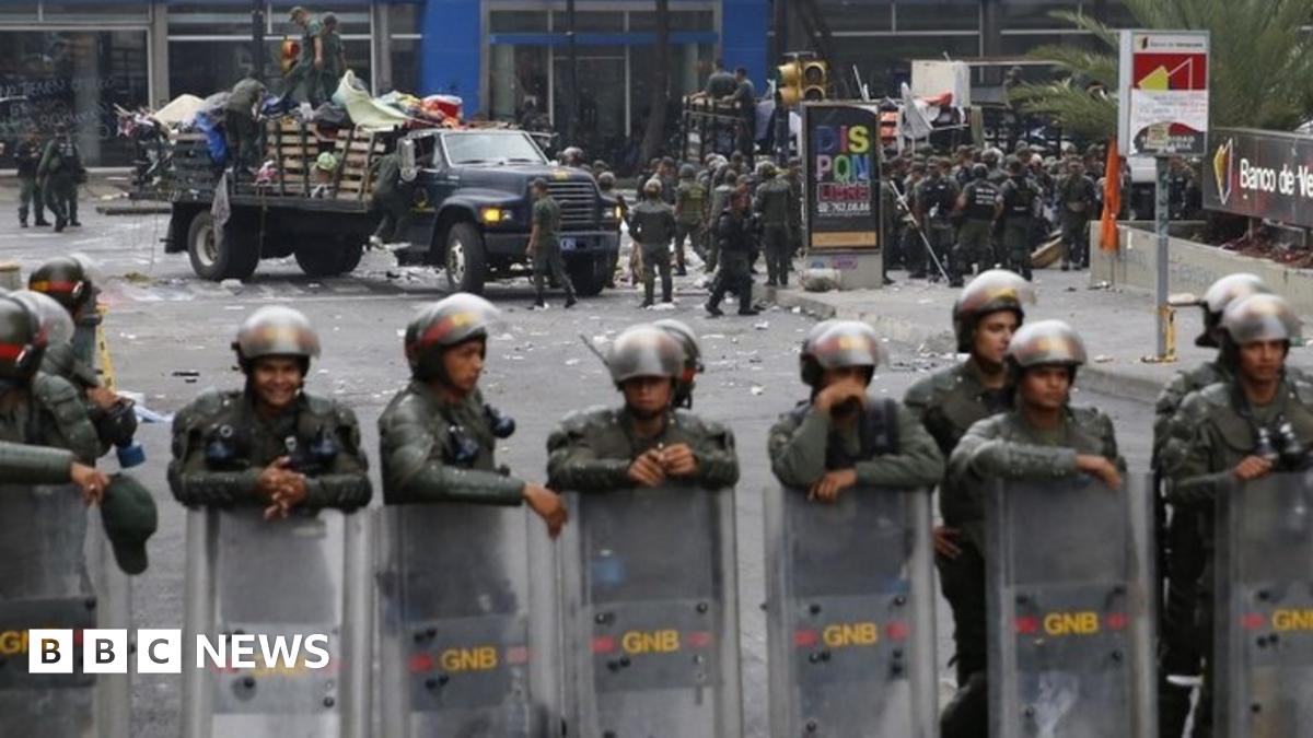 Venezuelan security forces break up protest camps - BBC News