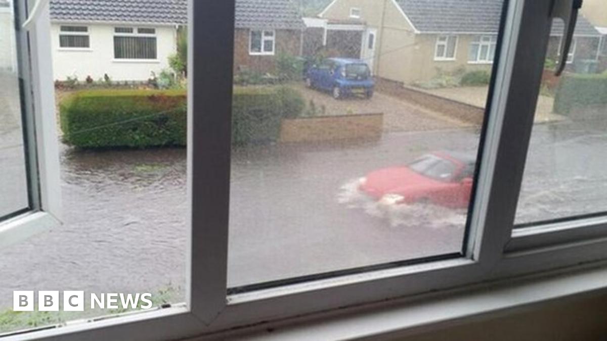 Heavy rain causes flash flooding in Norwich - BBC News