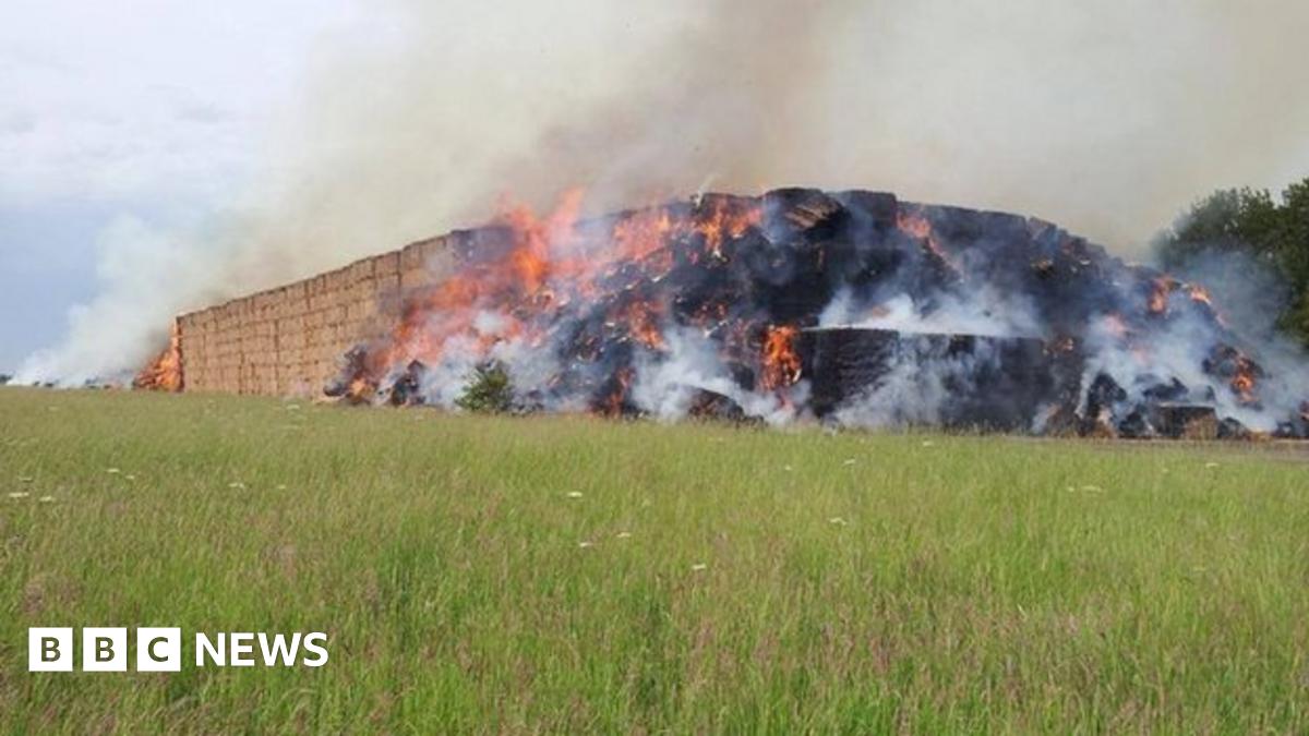 Waterbeach lightning strike haystack to 'burn for several days' - BBC News