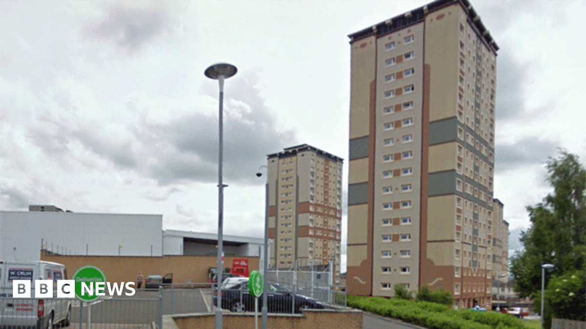 Residents return to Motherwell asbestos scare tower block - BBC News