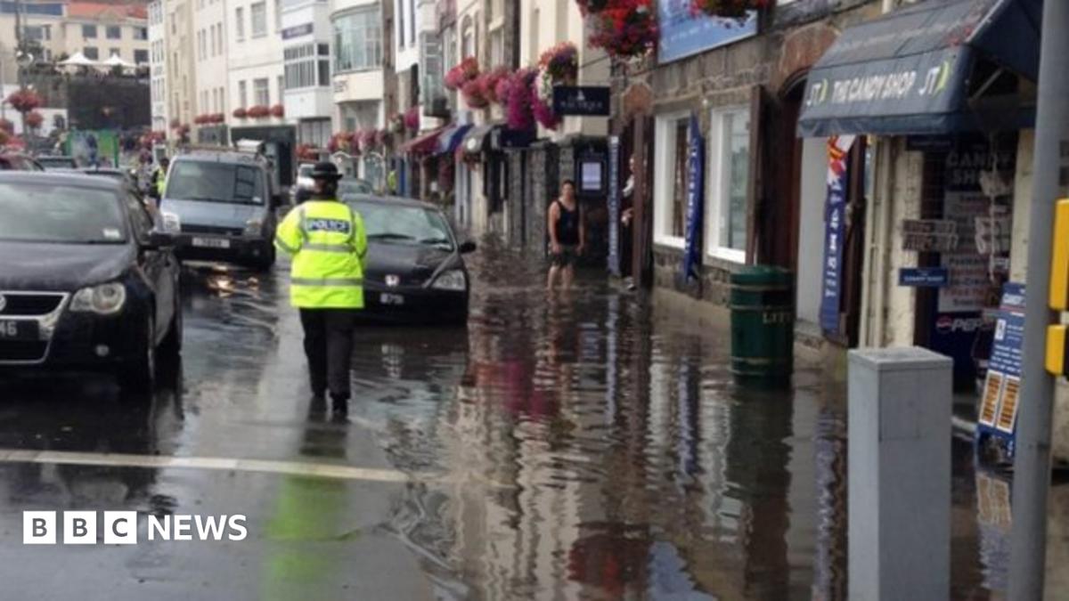 Guernsey flood measures 'overwhelmed' during downpour - BBC News