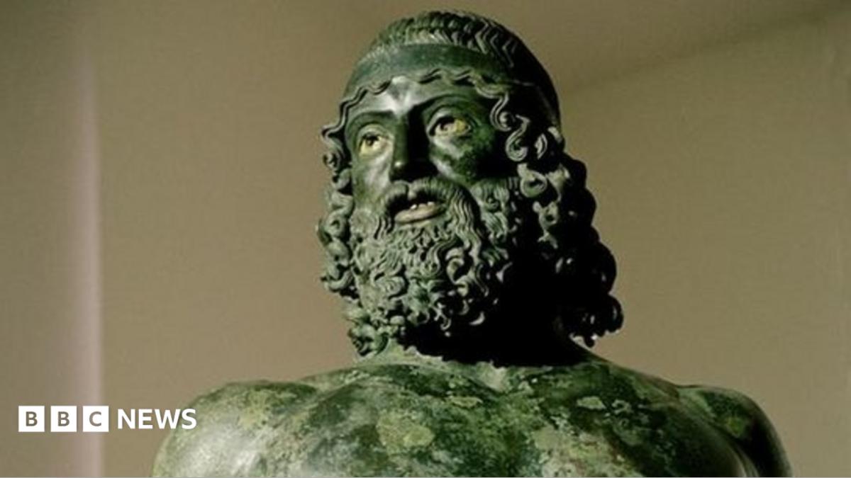Famous Italian statue in thong and feather boa row - BBC News