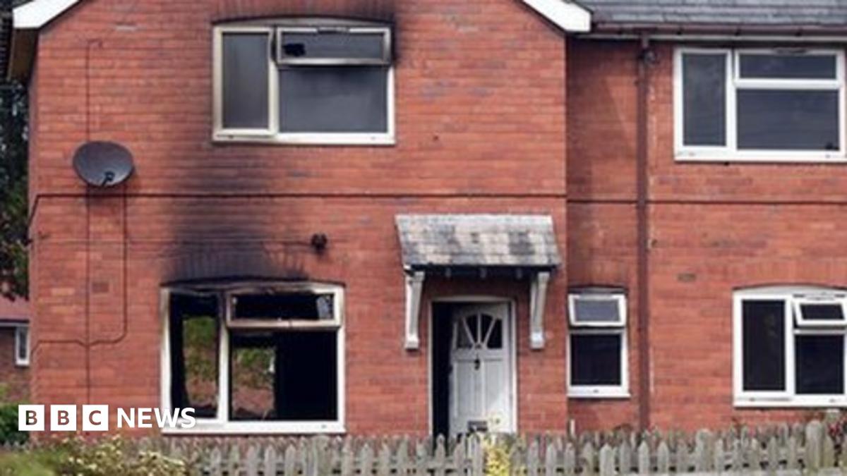 Ruabon house fire: Woman arrested on suspicion of arson - BBC News