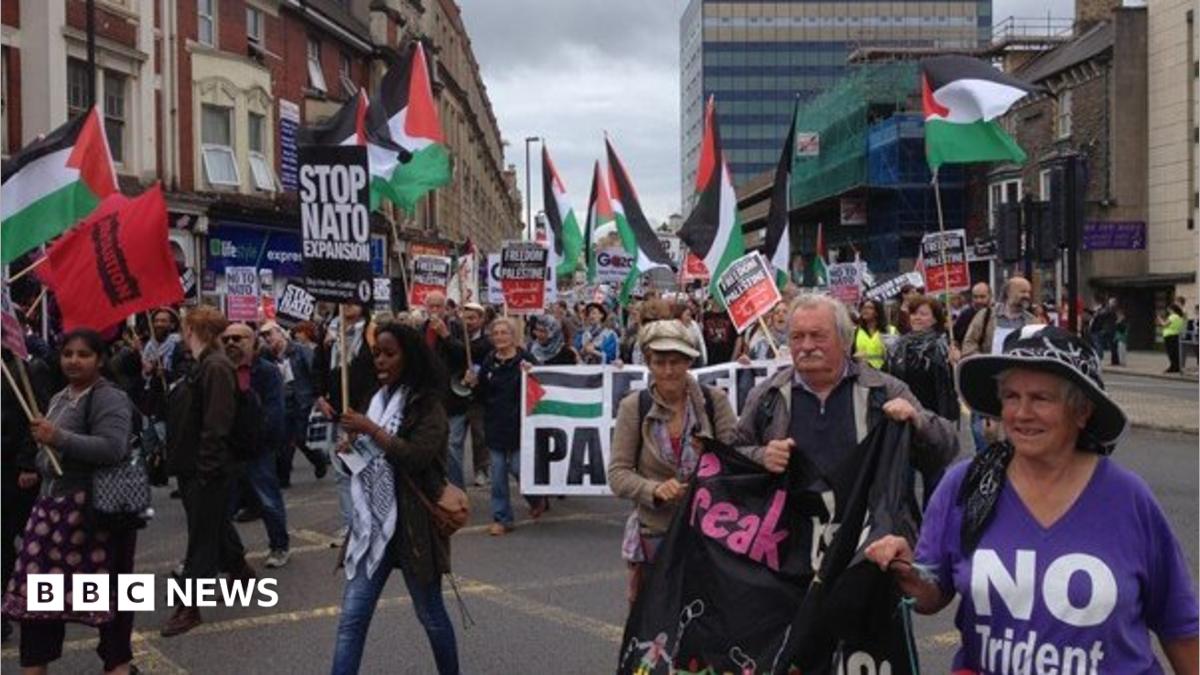 Hundreds join Nato protest march in Newport on Saturday - BBC News
