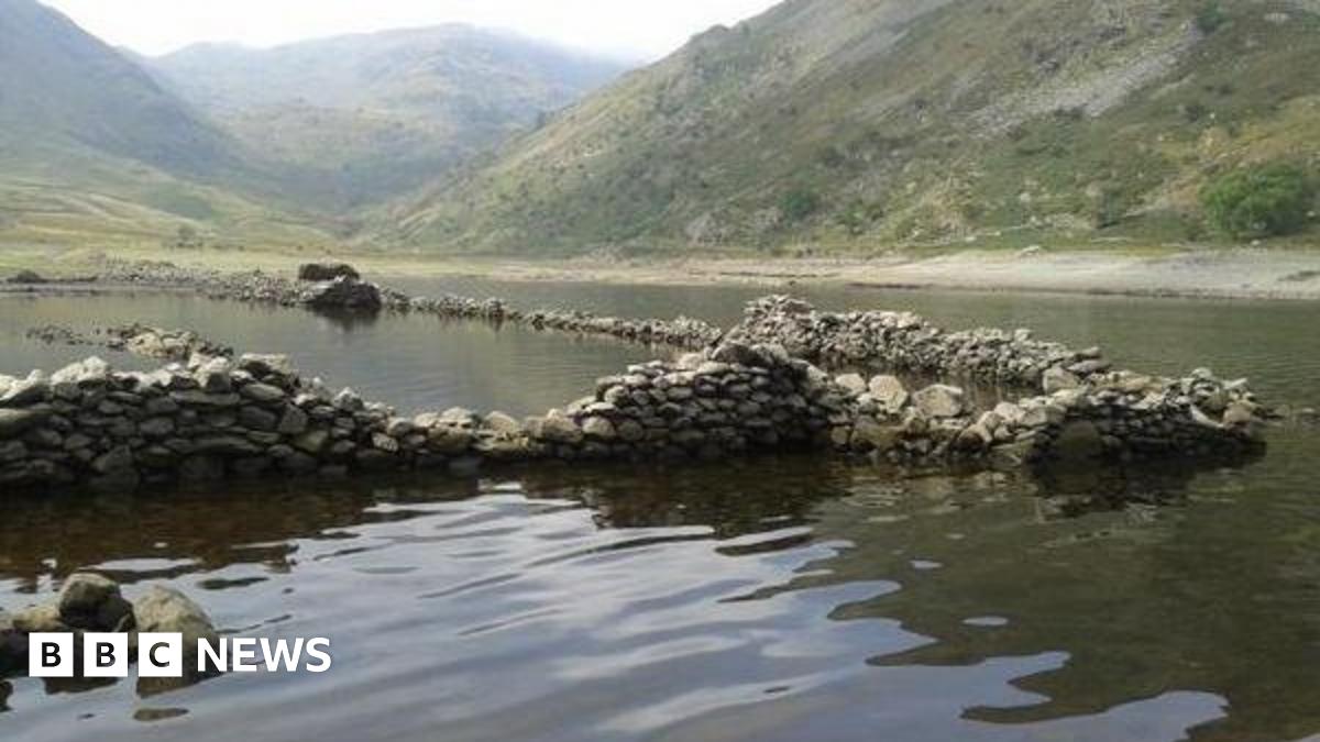 Flooded village of Mardale emerges after dry weather - BBC News