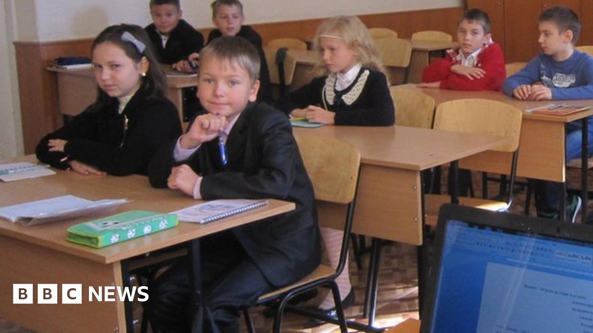 Ukraine shelling shatters Donetsk's first day of school - BBC News
