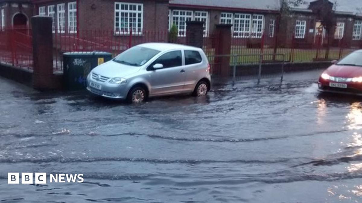 Belfast homes flooded after heavy rain - BBC News