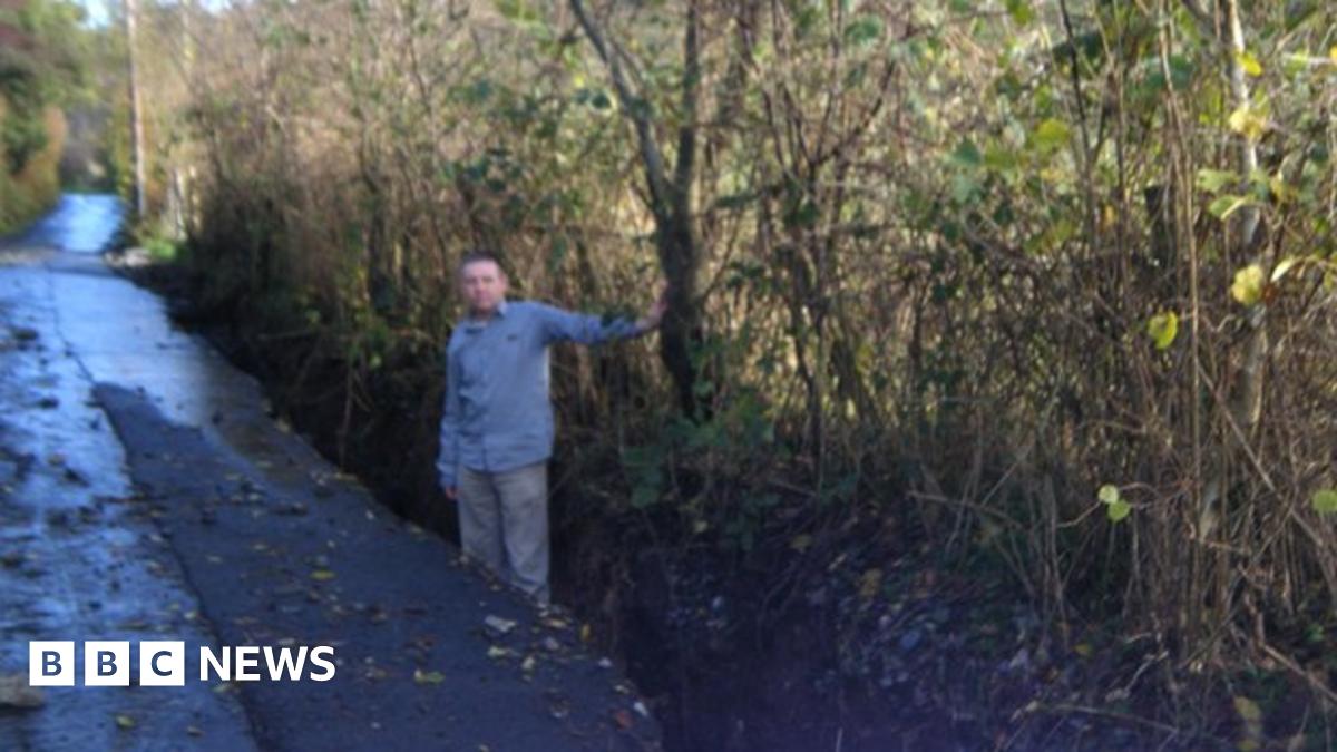 Lislea: 'Trench' appears in road after flood - BBC News
