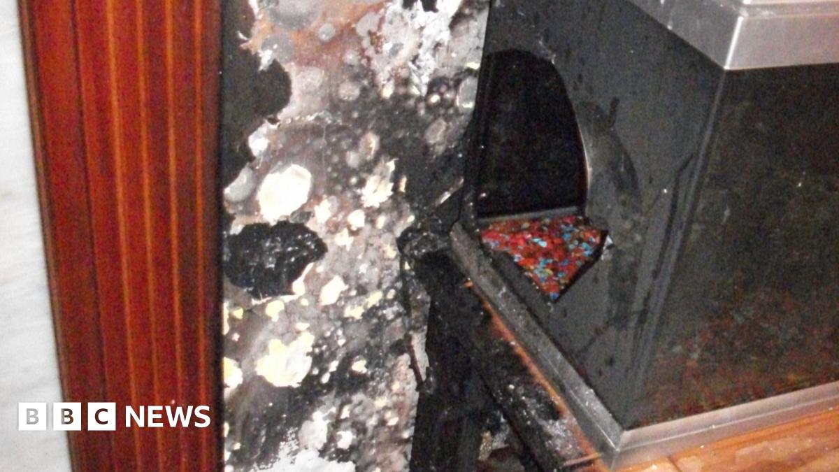 Shattered fish tank stops Warrington house fire - BBC News