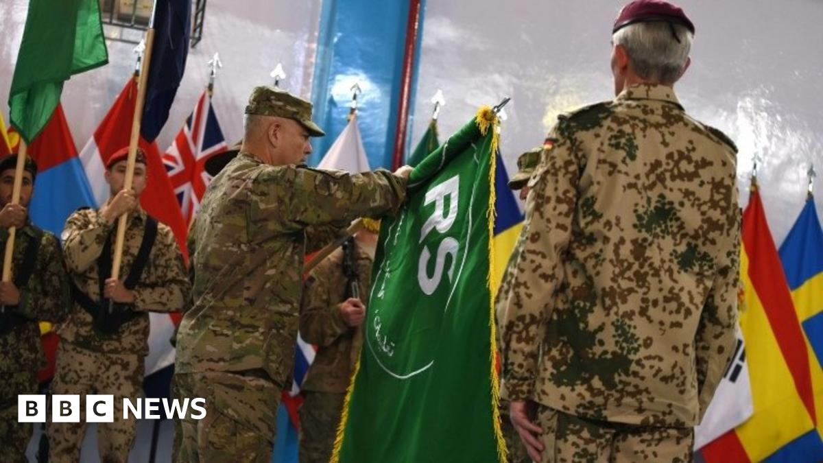 Nato marks transition to new Afghanistan mission - BBC News