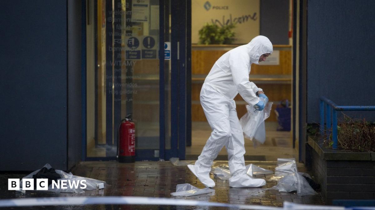 Woman critical after 'setting herself on fire' at police station - BBC News