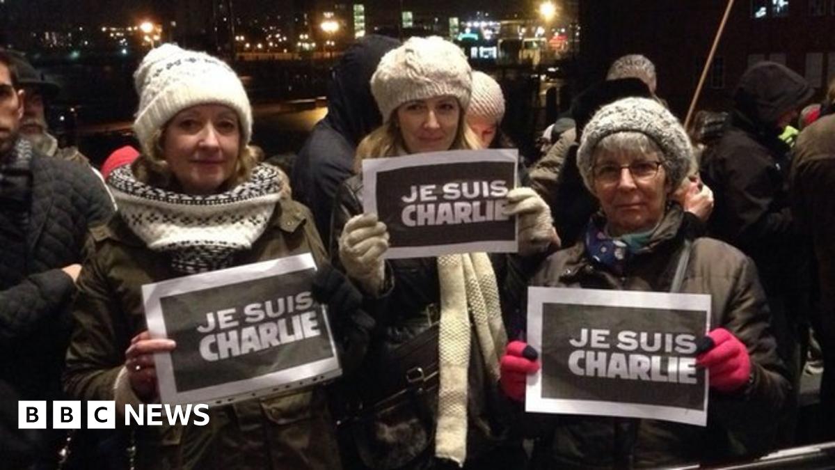 Cardiff Bay vigil after French terror attacks - BBC News