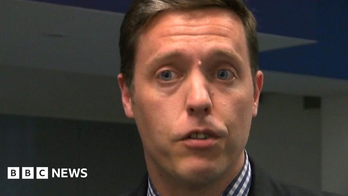 Norwich NHS chief Jonathon Fagge cleared of wife attack - BBC News