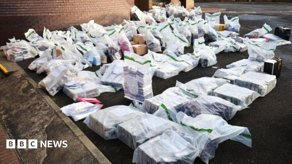 'Vast amount' of fake DVDs seized in Lisburn - BBC News