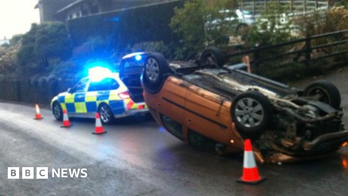 Car overturns in Cardiff rush hour crash - BBC News