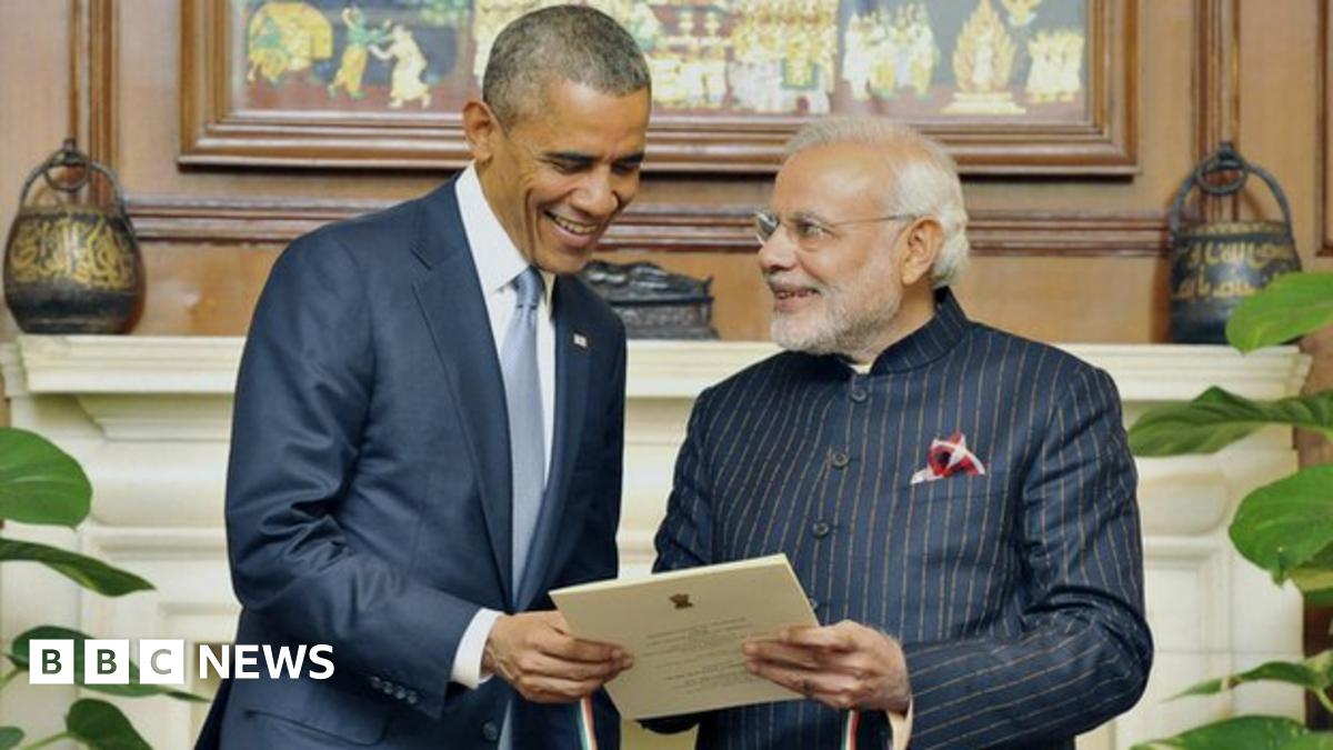India: Prime Minister Modi wears pinstripe 'name suit' - BBC News