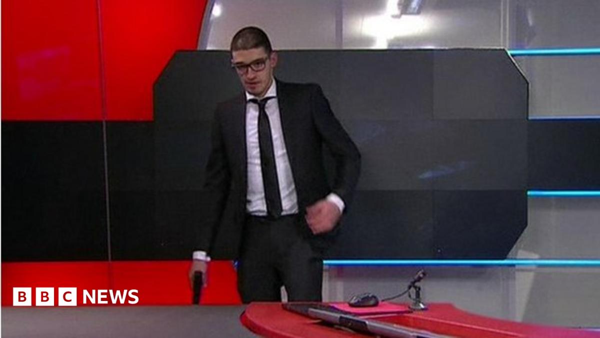 Man with fake gun disrupts Dutch broadcaster NOS - BBC News