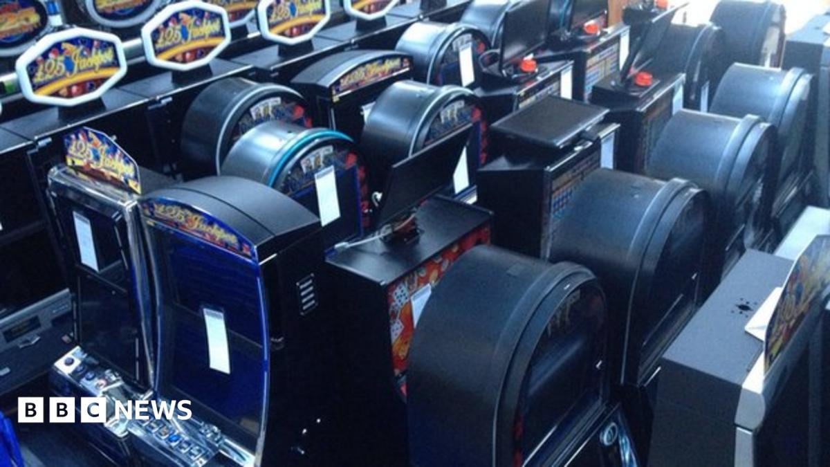 Belfast and Lisburn gambling probe: Machines and cash are seized - BBC News