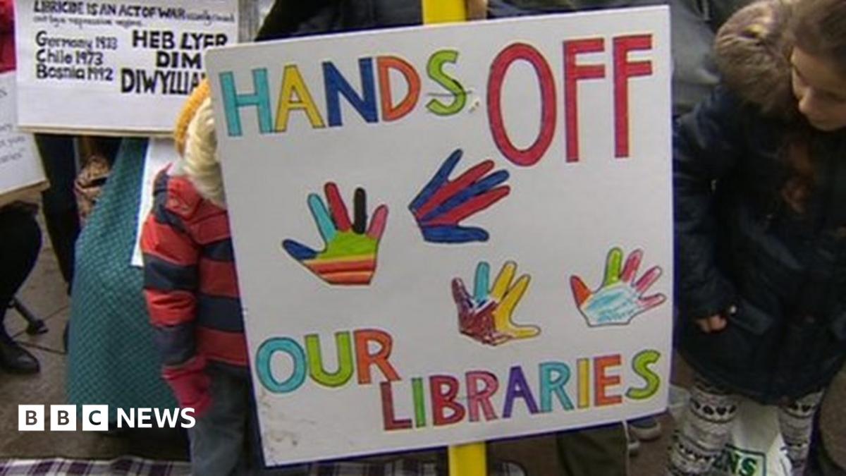Hundreds at Cardiff library cuts and closure protest - BBC News