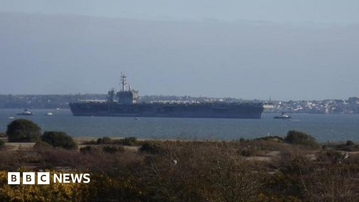 Navy warship USS Theodore Roosevelt arrives in Solent - BBC News