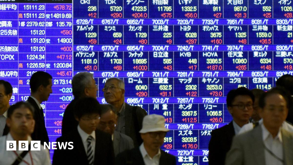 Nikkei hits 20,000 level for first time in 15 years - BBC News