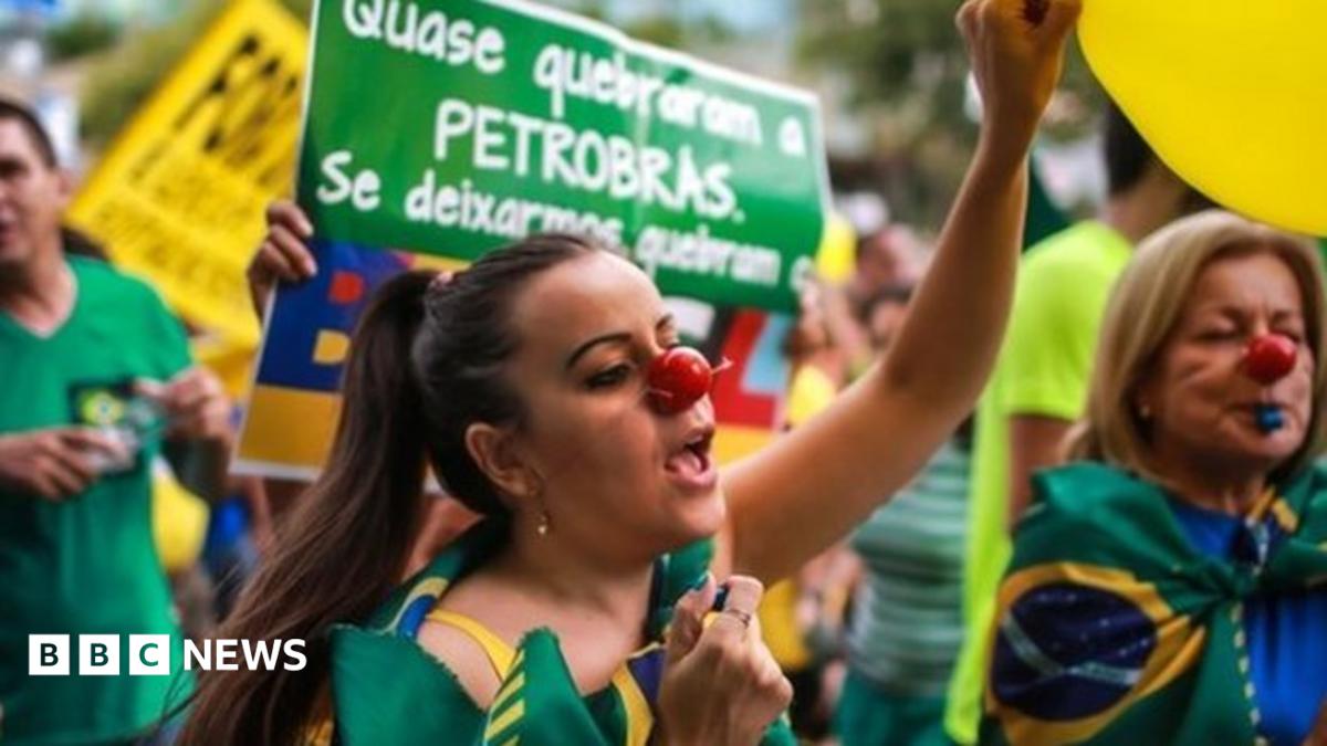 Hundreds of thousands rally against corruption in Brazil - BBC News
