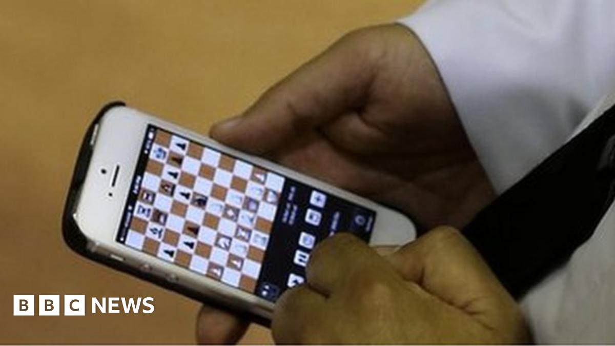 Chess player out of competition after toilet phone use - BBC News